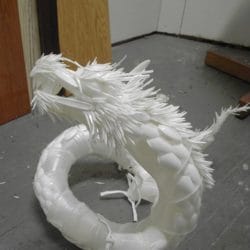 Plastic cups, spoons and forks dragon