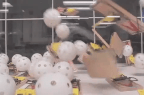 Slow motion: Using ping-pongs and mouse traps to simulate a nuclear ...