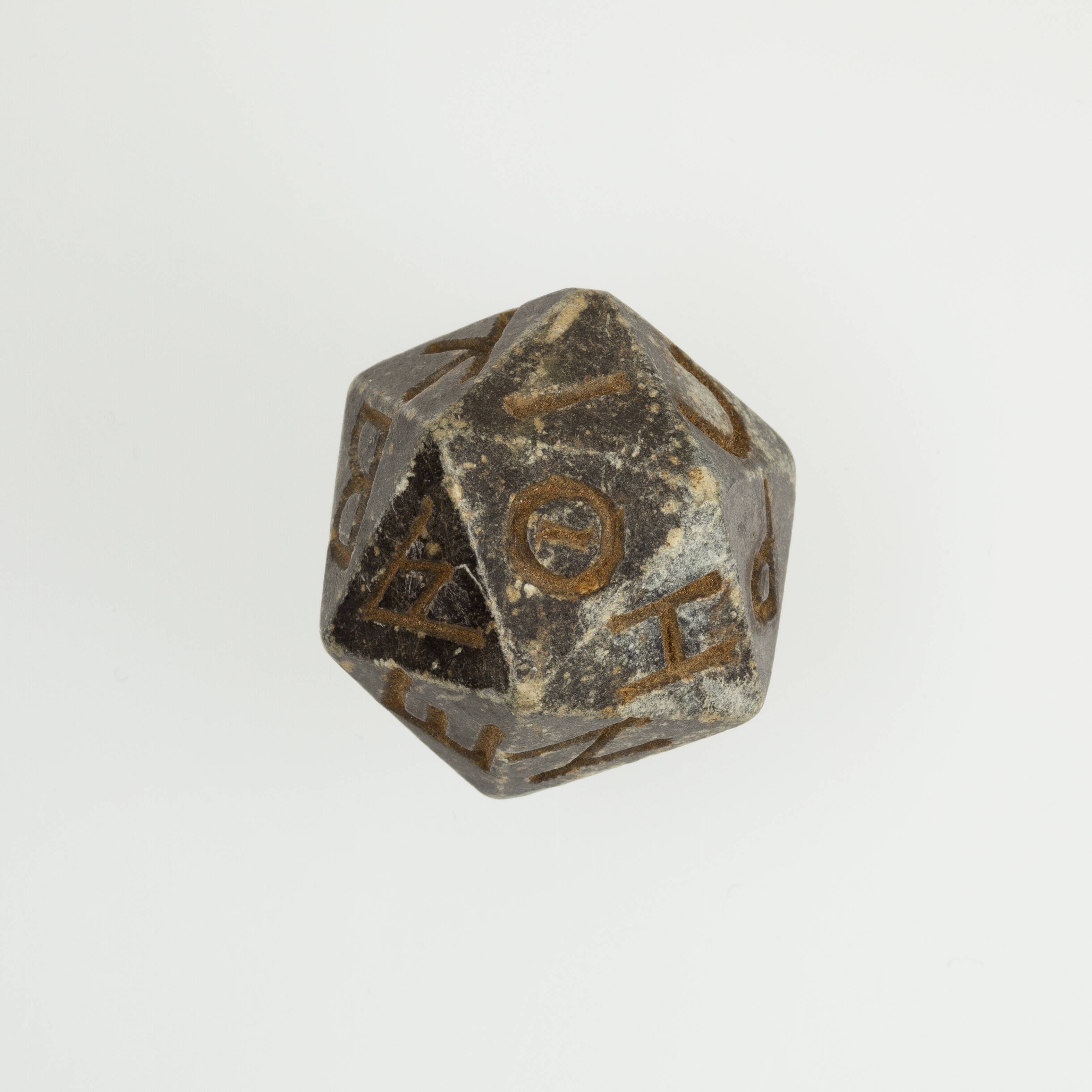 This dice is between 1,700 and 4,000 years old