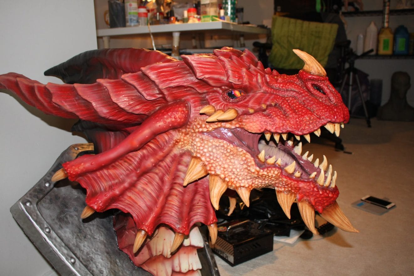 The majestic restoration of this red dragon's mounted head