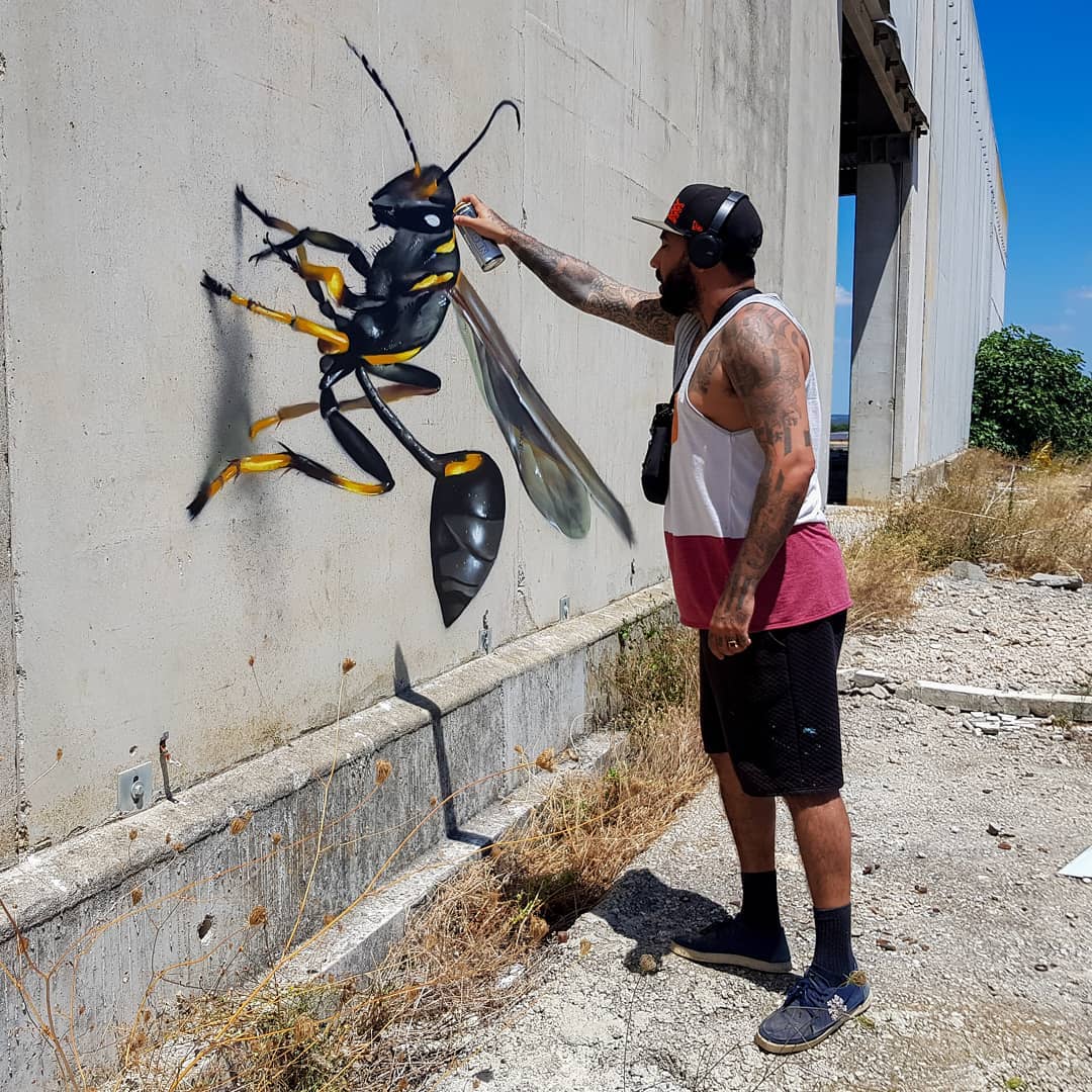 Anamorphic urban insect art to scare your players